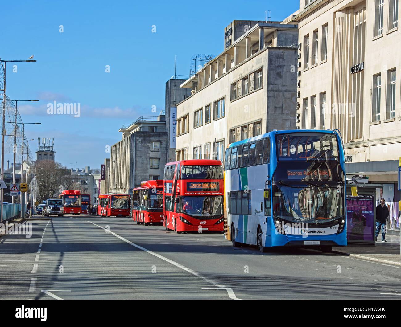 Scheduled service buses at stops on Royal Parade in Plymouth City ...
