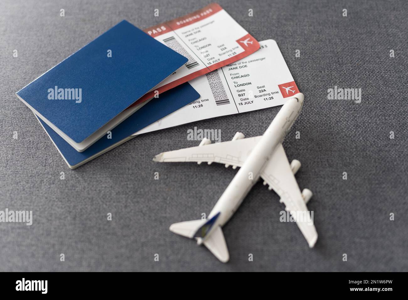 Two passports boarding passes hi-res stock photography and images - Alamy