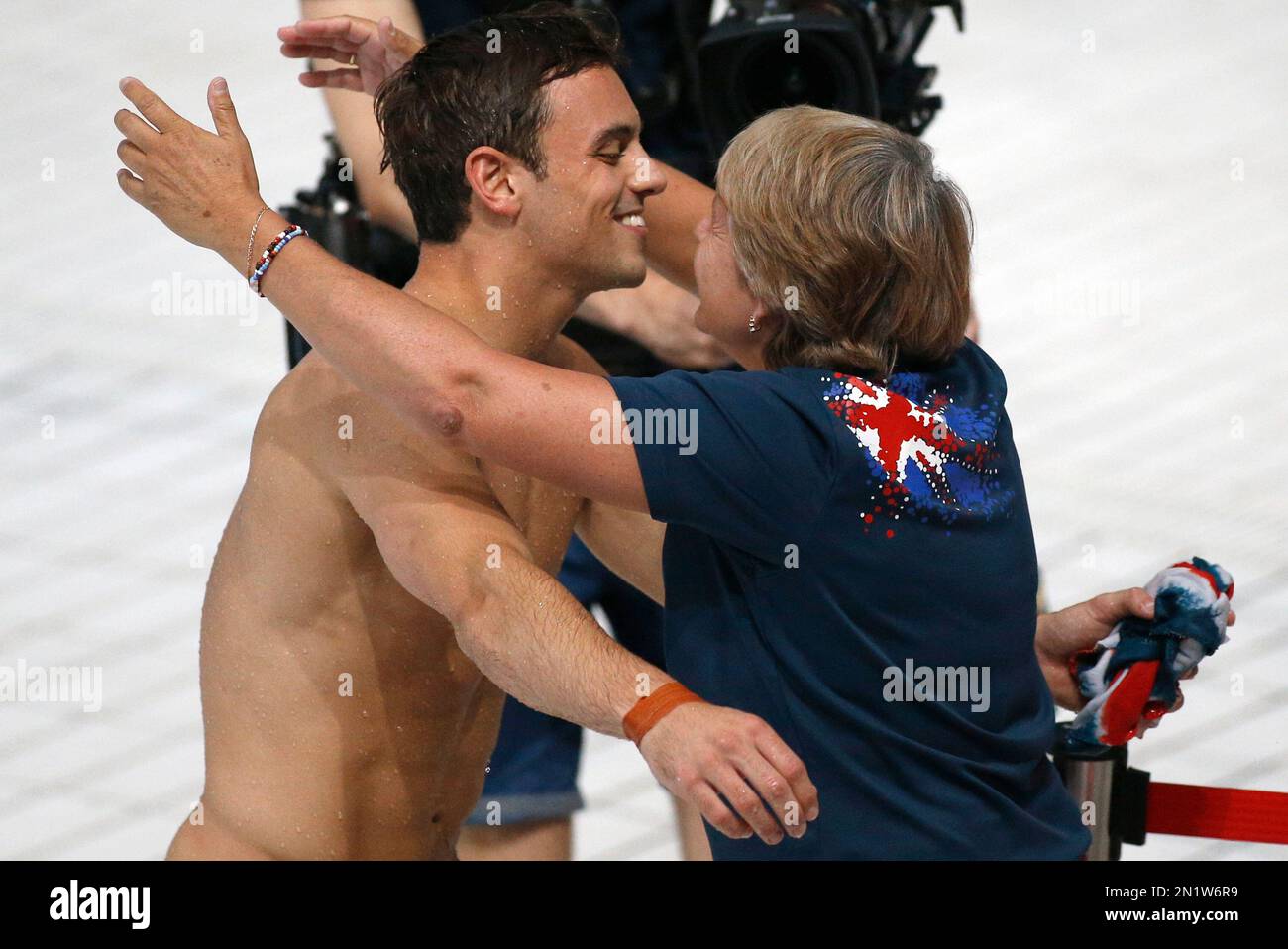 Britain's bronze medalist Thomas Daley celebrates his victory with ...
