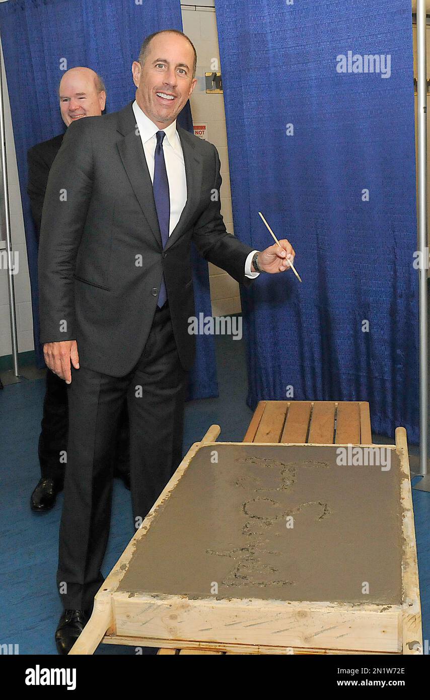 With fellow comedian and opening act Larry Miller looking over his ...