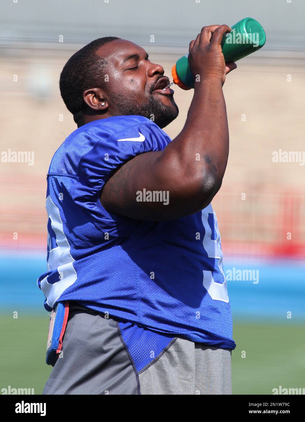 Buffalo Bills defensive tackle Marcell Dareus (99) takes a drink during ...