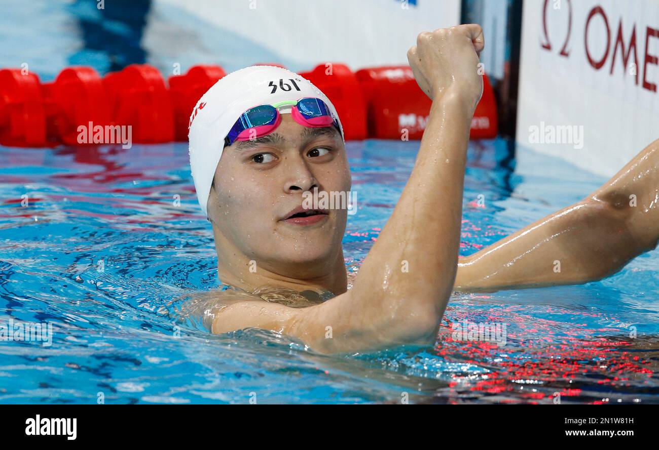 China's Sun Yang celebrates after winning the gold medal during the men ...