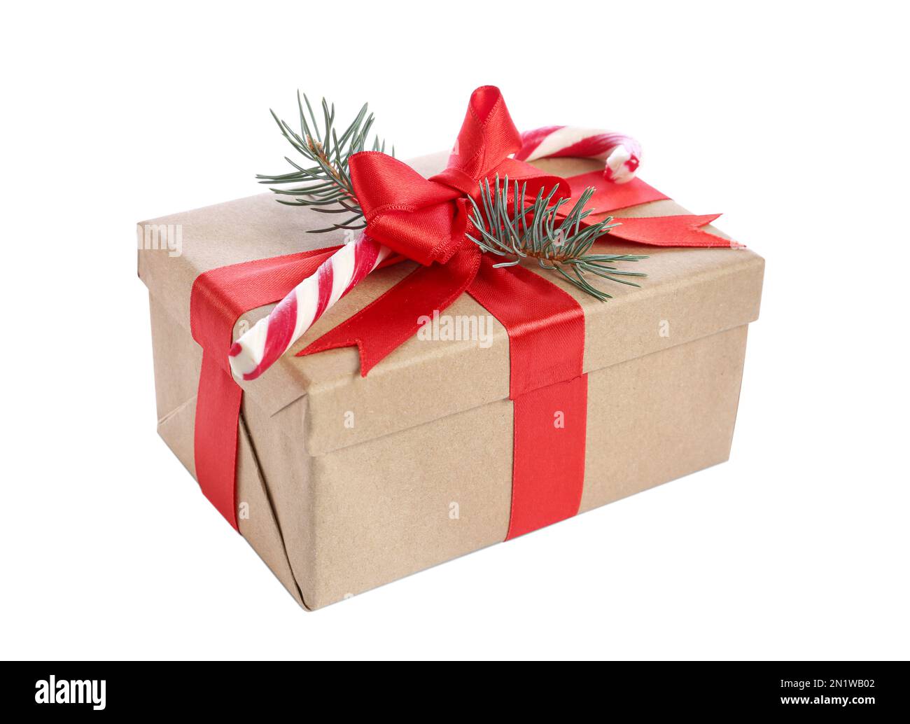 Christmas gift box decorated with red bow, candy cane and fir tree ...