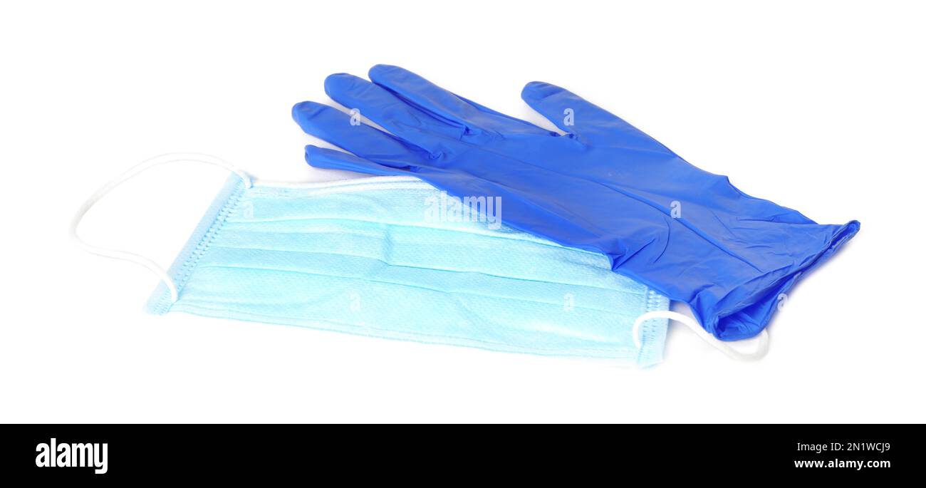 Medical glove and protective face mask on white background Stock Photo ...