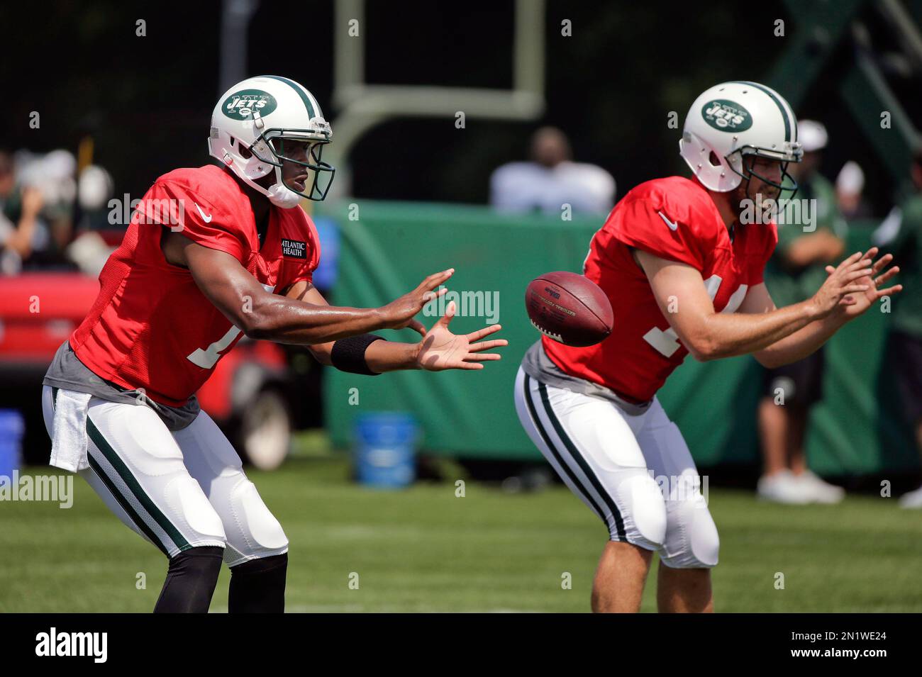 New York Jets quarterback Geno Smith (7) and quarterback Ryan ...