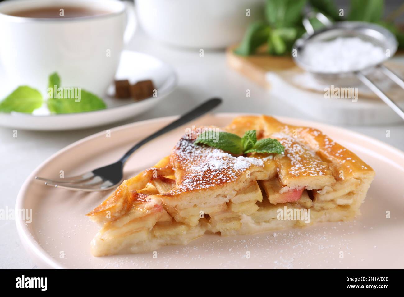Slice of traditional apple pie on plate, closeup Stock Photo - Alamy
