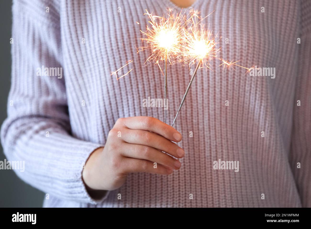 Burning firework sparkler detail hi-res stock photography and images ...