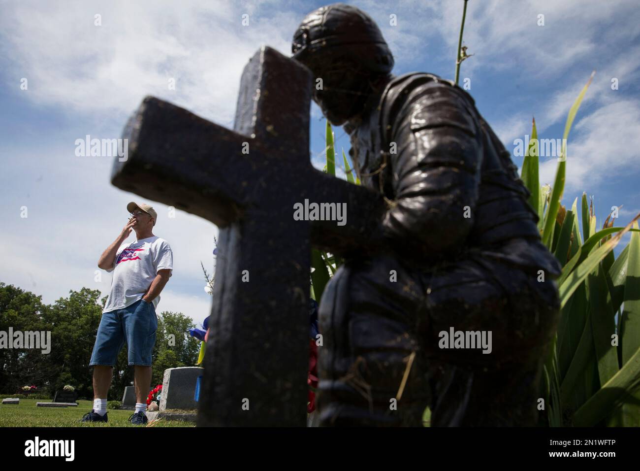 In this Saturday, July 25, 2015 photo Keith Wightman takes a drag of ...