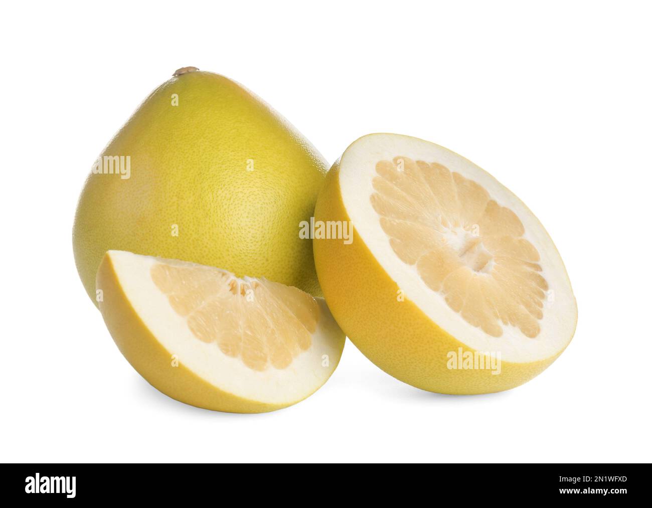 Fresh cut and whole pomelo fruits isolated on white Stock Photo - Alamy