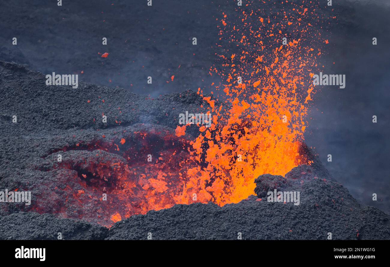 Lava erupts from the Piton de la Fournaise "Peak of the Furnace" volcano, on the southeastern ...