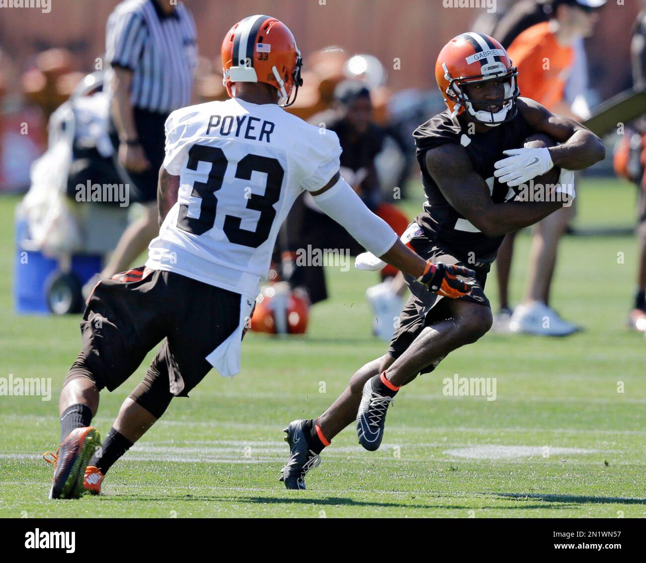 Cleveland Browns wide receiver Taylor Gabriel, right, scrambles past ...