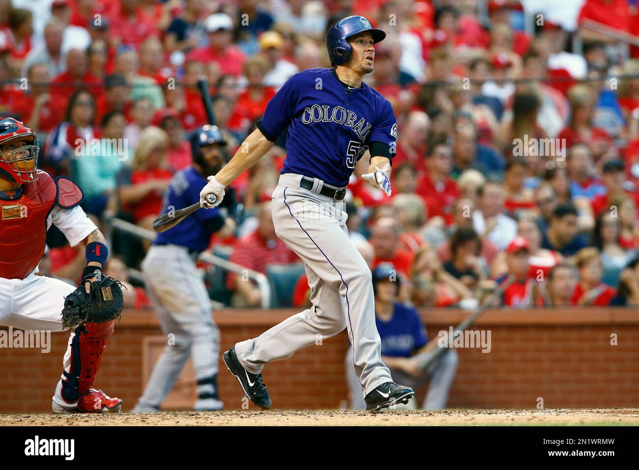 Colorado Rockies' Chris Rusin watches his two-run home run hit off St ...