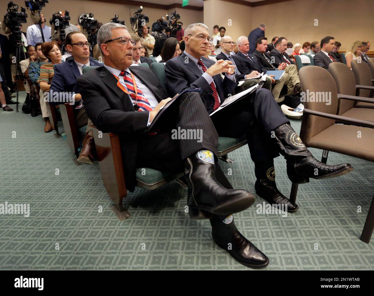 Texas Department of Public Safety Deputy Director Steve McCraw, right ...