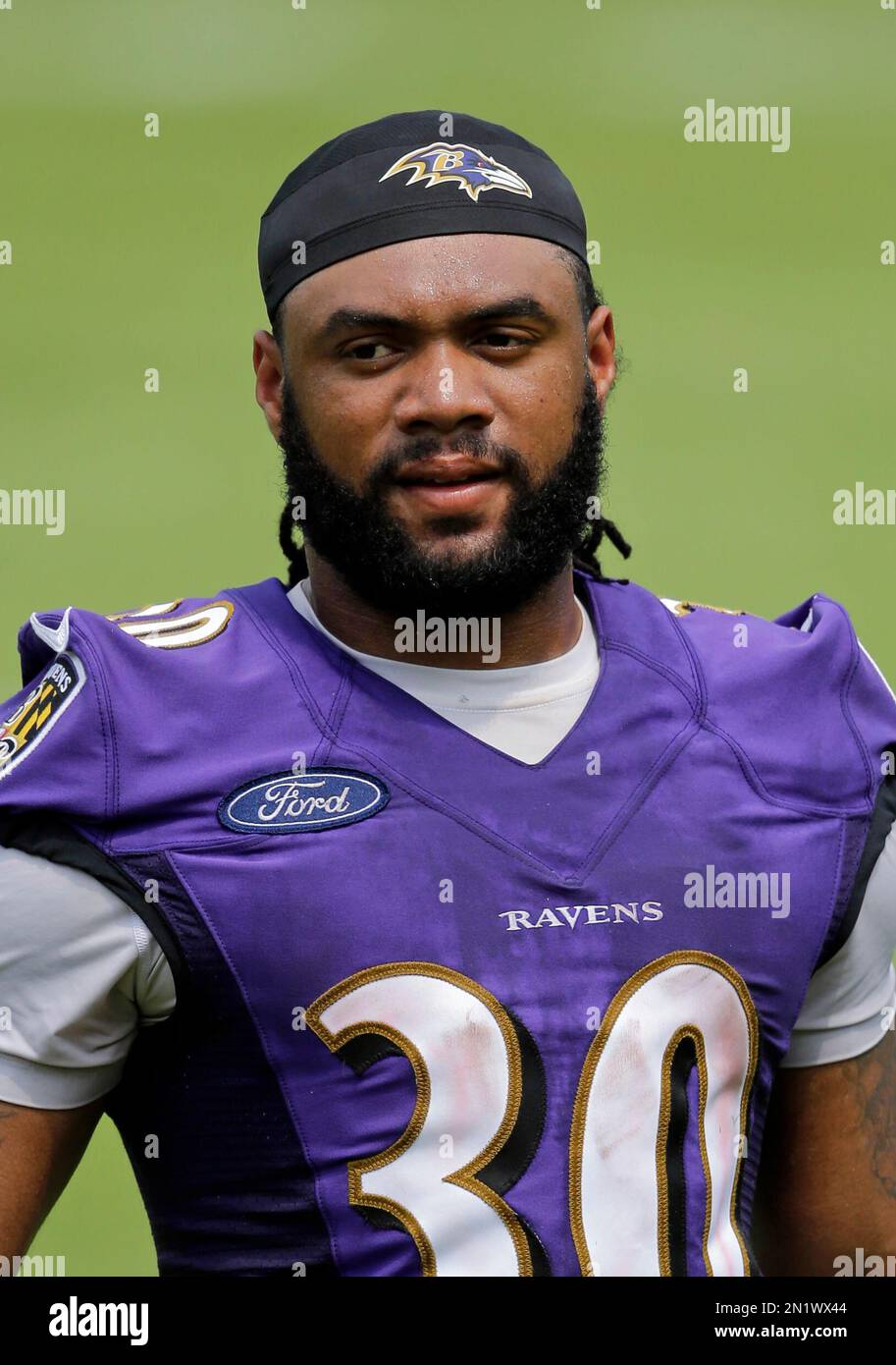 Baltimore Ravens running back Terrence Magee walks off the field after ...