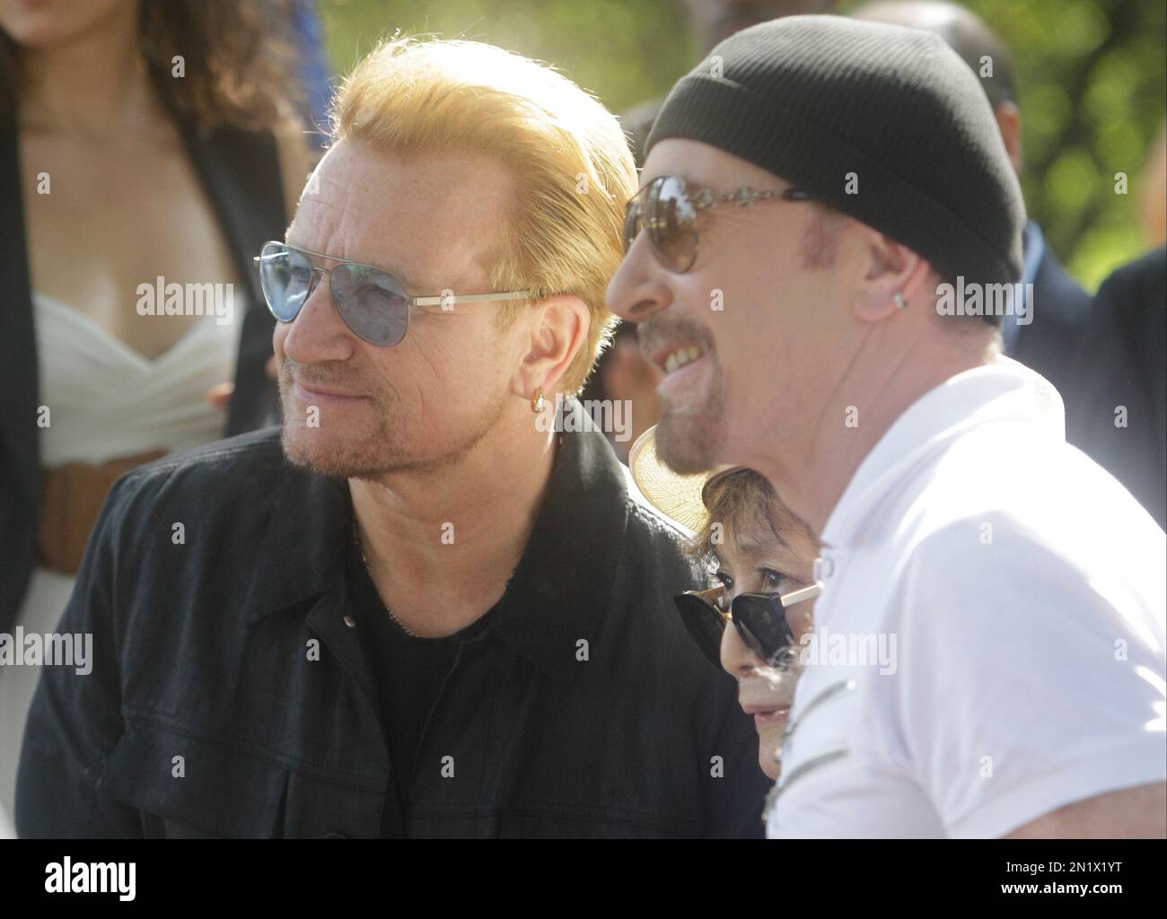 Bono, left, and The Edge, of the Irish rock band U2, attend the ...