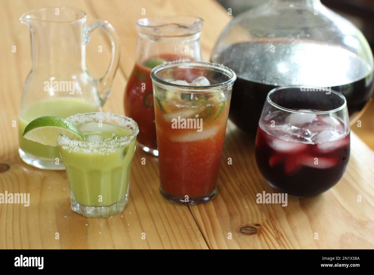 This July 13, 2015 photo shows, from left, cilantro corn margaritas ...