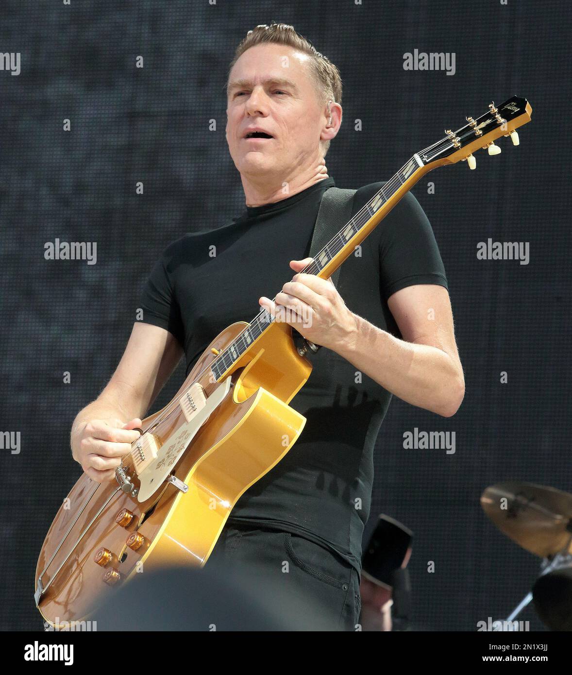 Singer-songwriter Bryan Adams performs in concert during his “Reckless ...