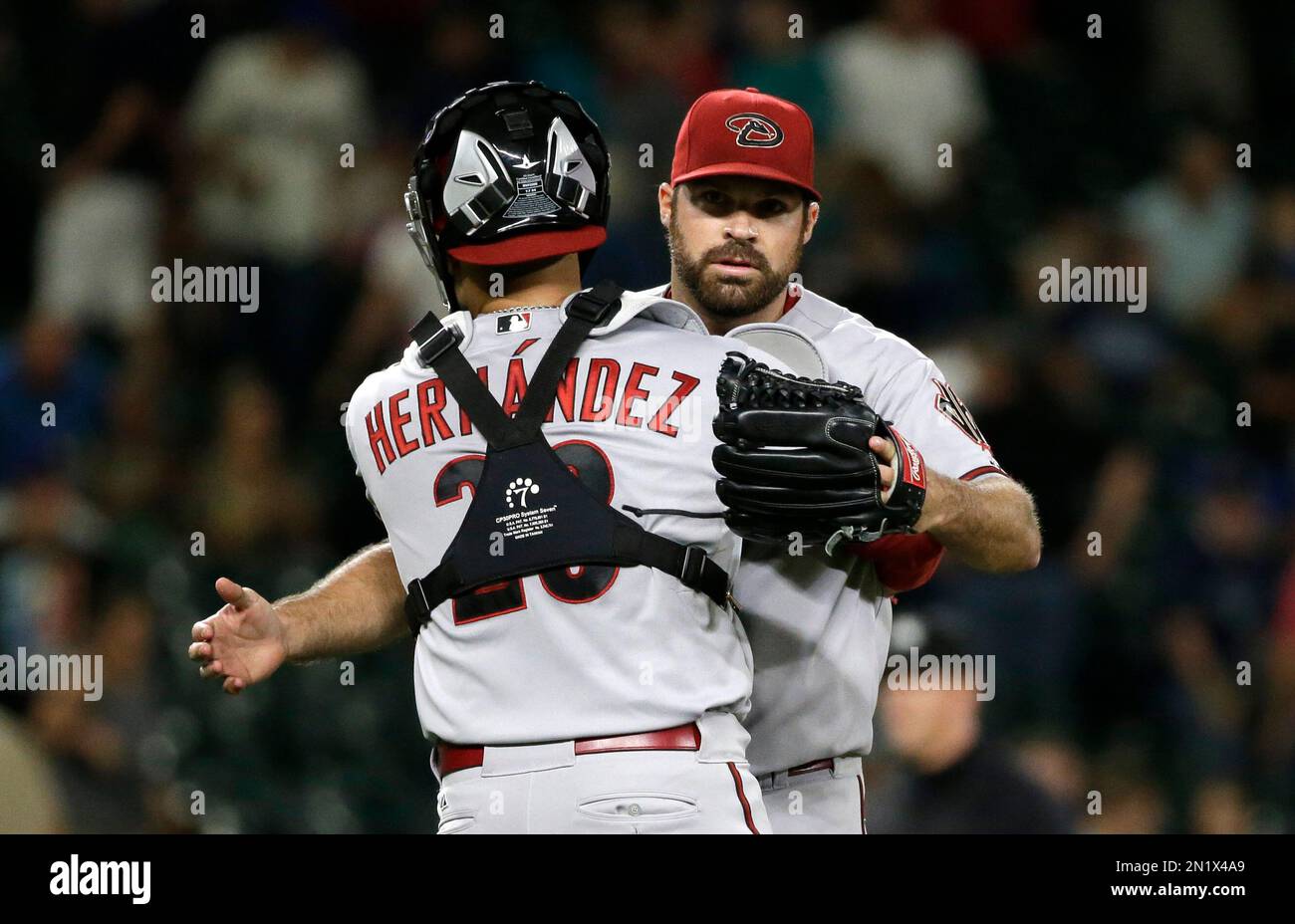 Arizona Diamondbacks closing pitcher Josh Collmenter, right, embraces ...