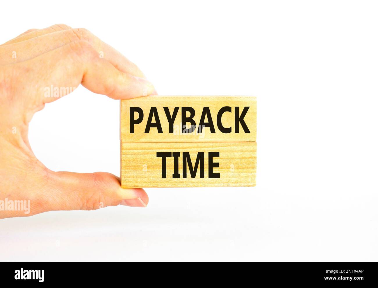 Payback time symbol. Concept words Payback time on wooden blocks ...