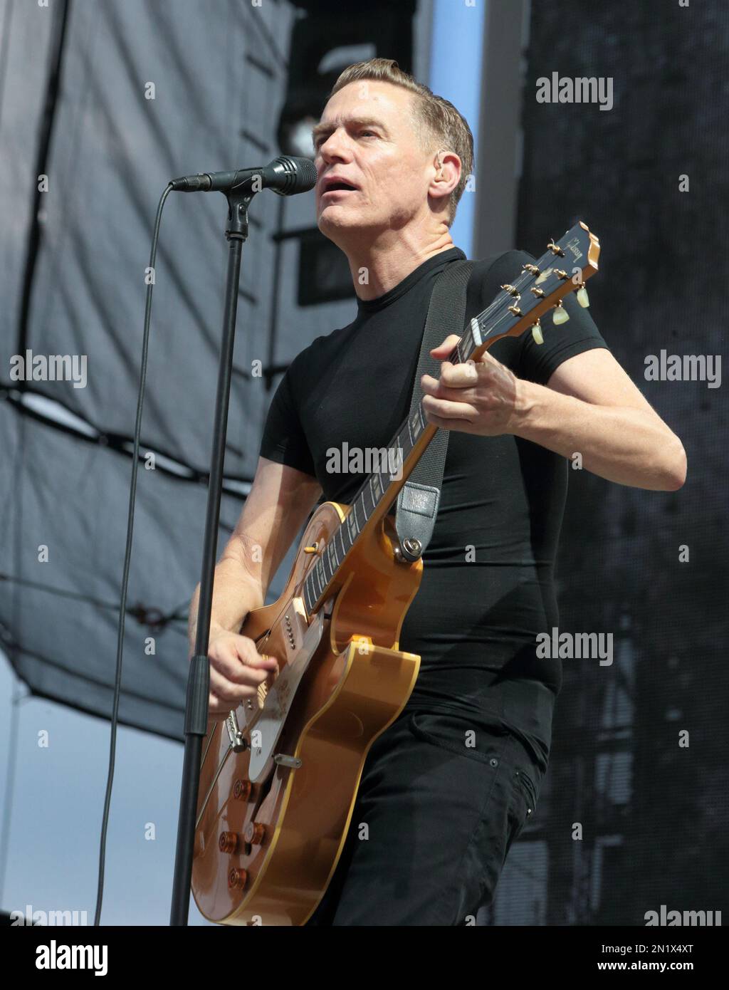 Singer-songwriter Bryan Adams performs in concert during his “Reckless ...