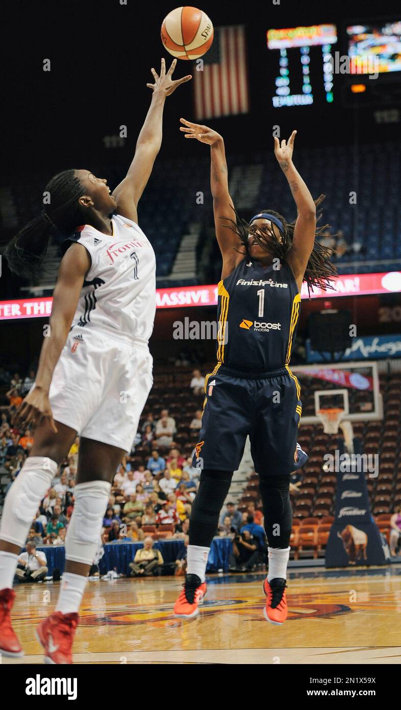 Indiana Fever’s Shavonte Zellous, right, shoots over Connecticut Sun’s ...