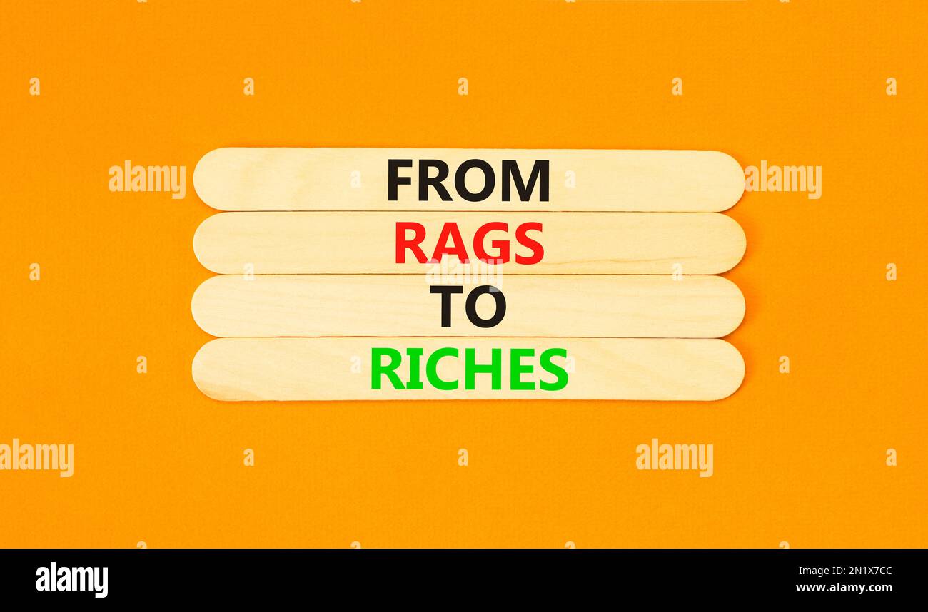 Rags or riches symbol. Concept words From rags to riches on wooden ...