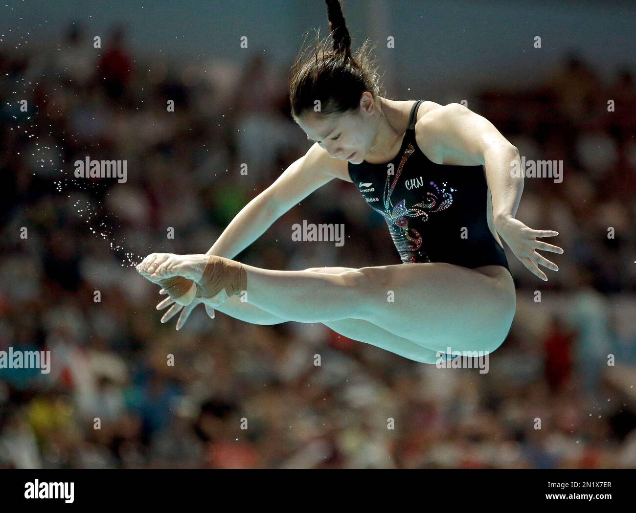 China's bronze medalist He Zi performs during the Women's 1m ...
