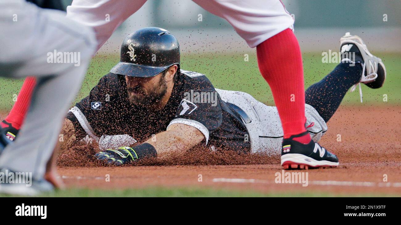 Chicago White Sox designated hitter Adam Eaton beats the tag by Boston ...