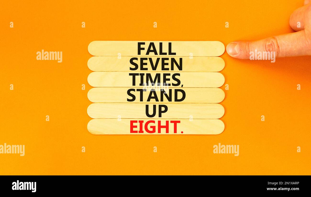 Stand up symbol. Concept words Fall seven times stand up eight on ...