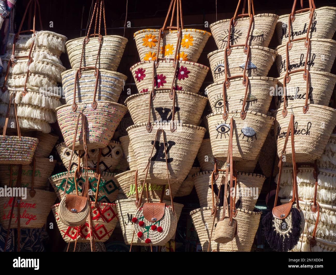 Moroccan artisan bags exposed in the street of a shop in Marrakech ...