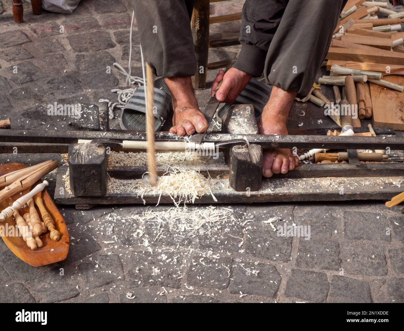 Craftsman working typical Moroccan artisan wood in a workshop of ...