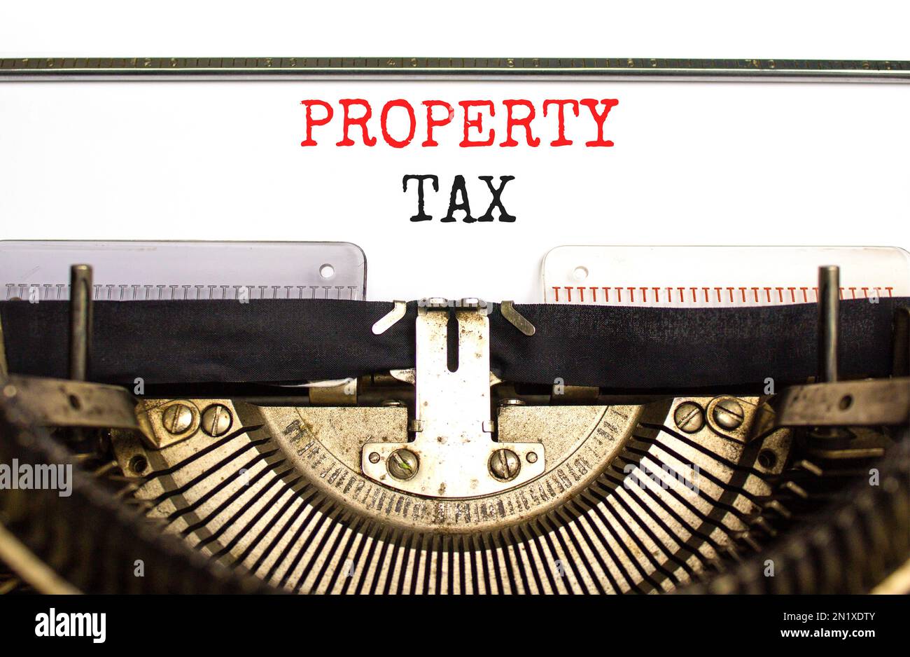 Property tax symbol. Concept words Property tax typed on old retro ...