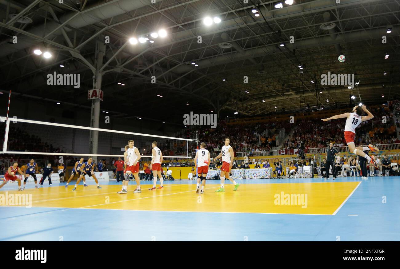 Canada's Nicholas Hoag serves to Puerto Rico during their bronze medal ...