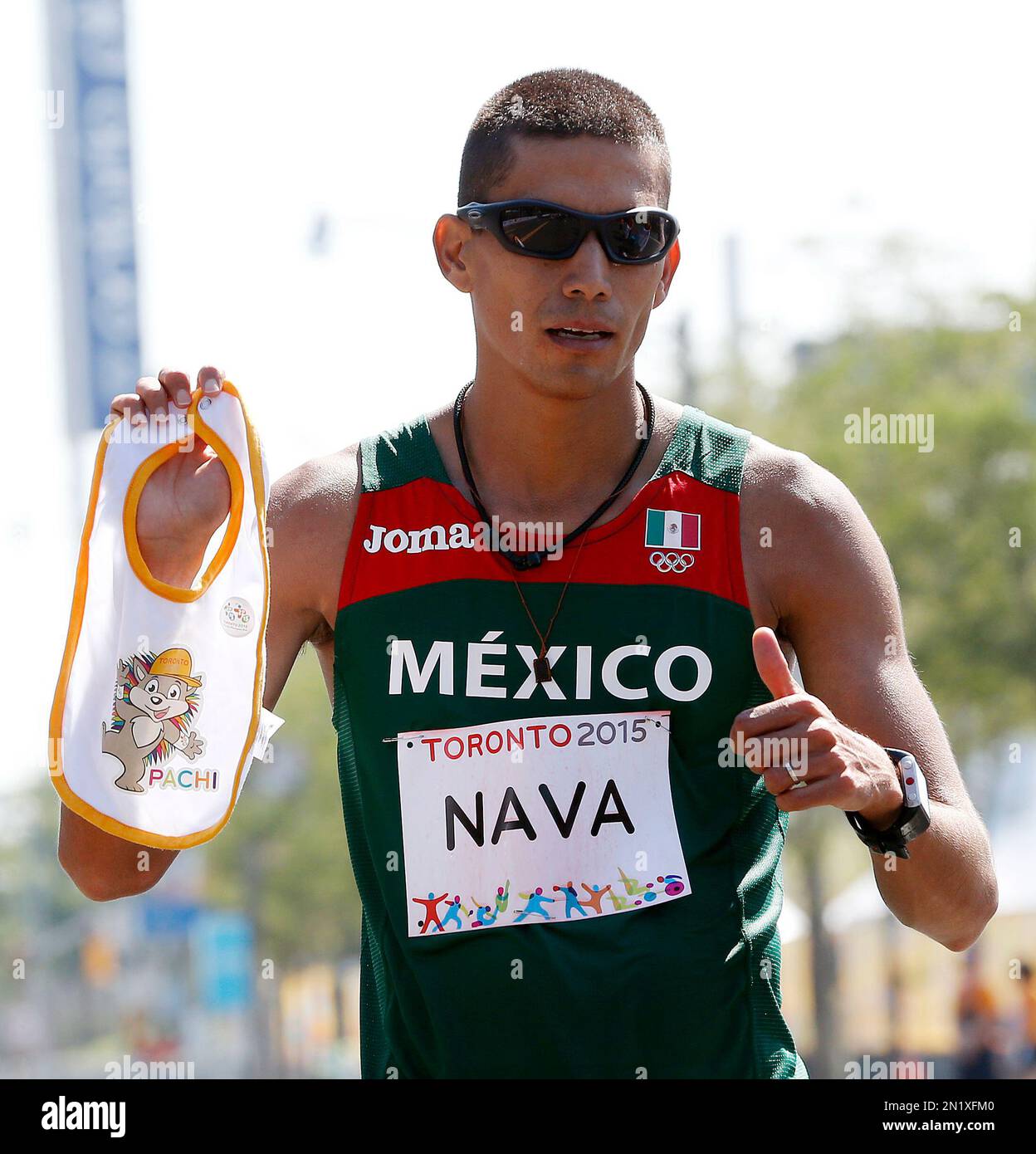 Mexico's Horacio Nava displays a bib in honor of the upcoming birth of a his child after ...
