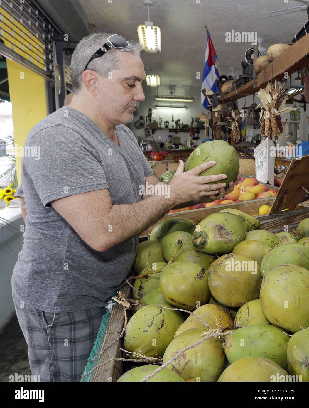 In this photo taken Tuesday, June 9, 2015, shopper Julian Fojon-Losada ...