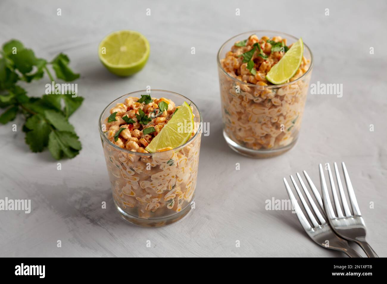 Homemade Mexican Corn Elote Esquites in Cups, side view Stock Photo - Alamy
