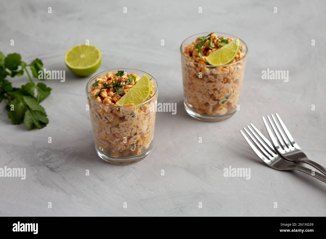 Homemade Mexican Corn Elote Esquites in Cups, side view Stock Photo - Alamy