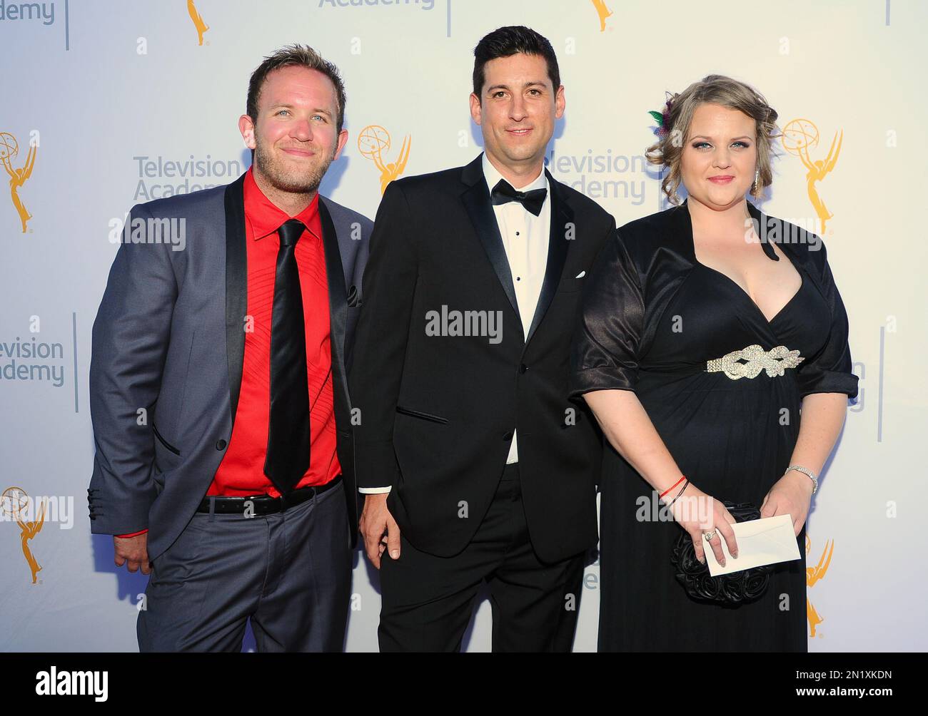 Zac Polhamus, from left, Steve Seledee and Melanie Wagor arrive at the ...