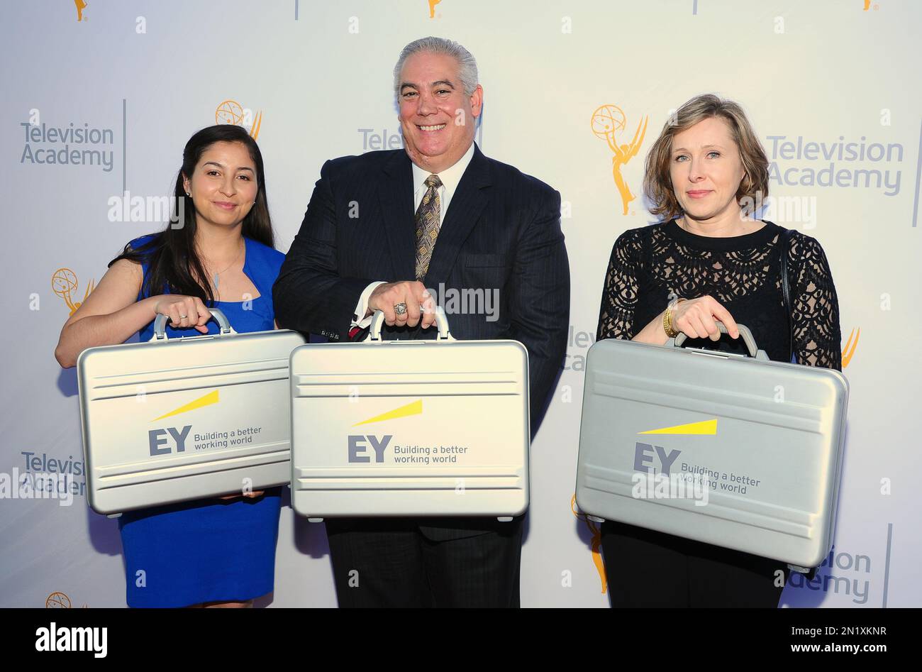 Edith Varela, from left, Andy Sale, and Agnes Janiczek of Ernst & Young ...