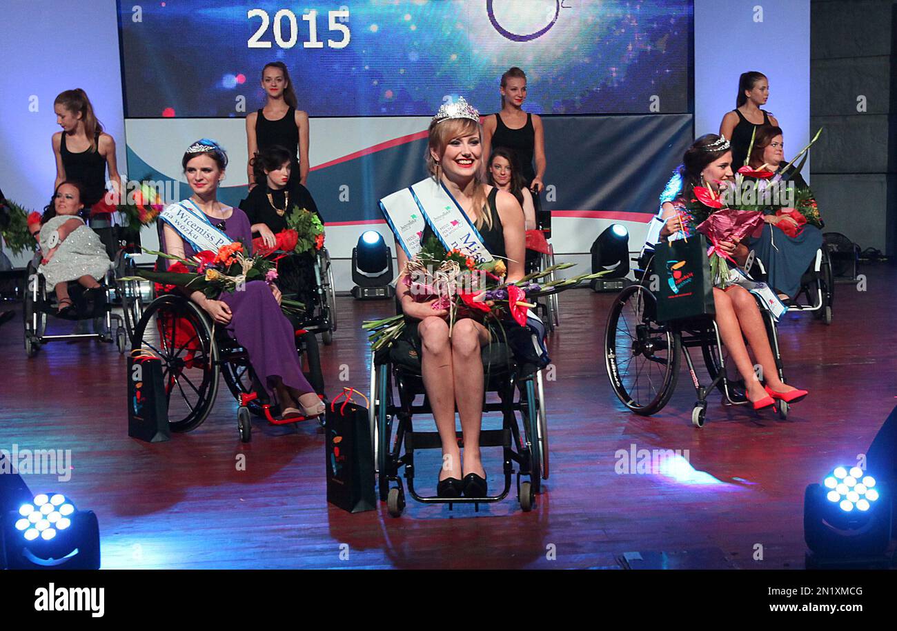 New Miss Wheelchair Katarzyna Koziol, center, pose for photos during ...