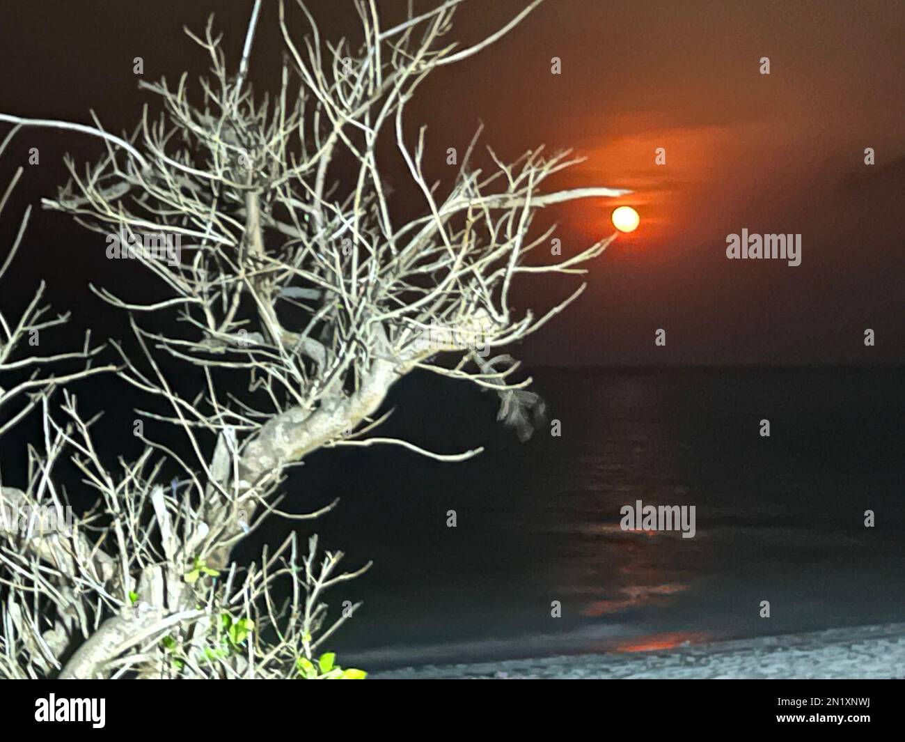 Pag Asa Island, Philippines. 06th Feb, 2023. The full snow moon rises ...