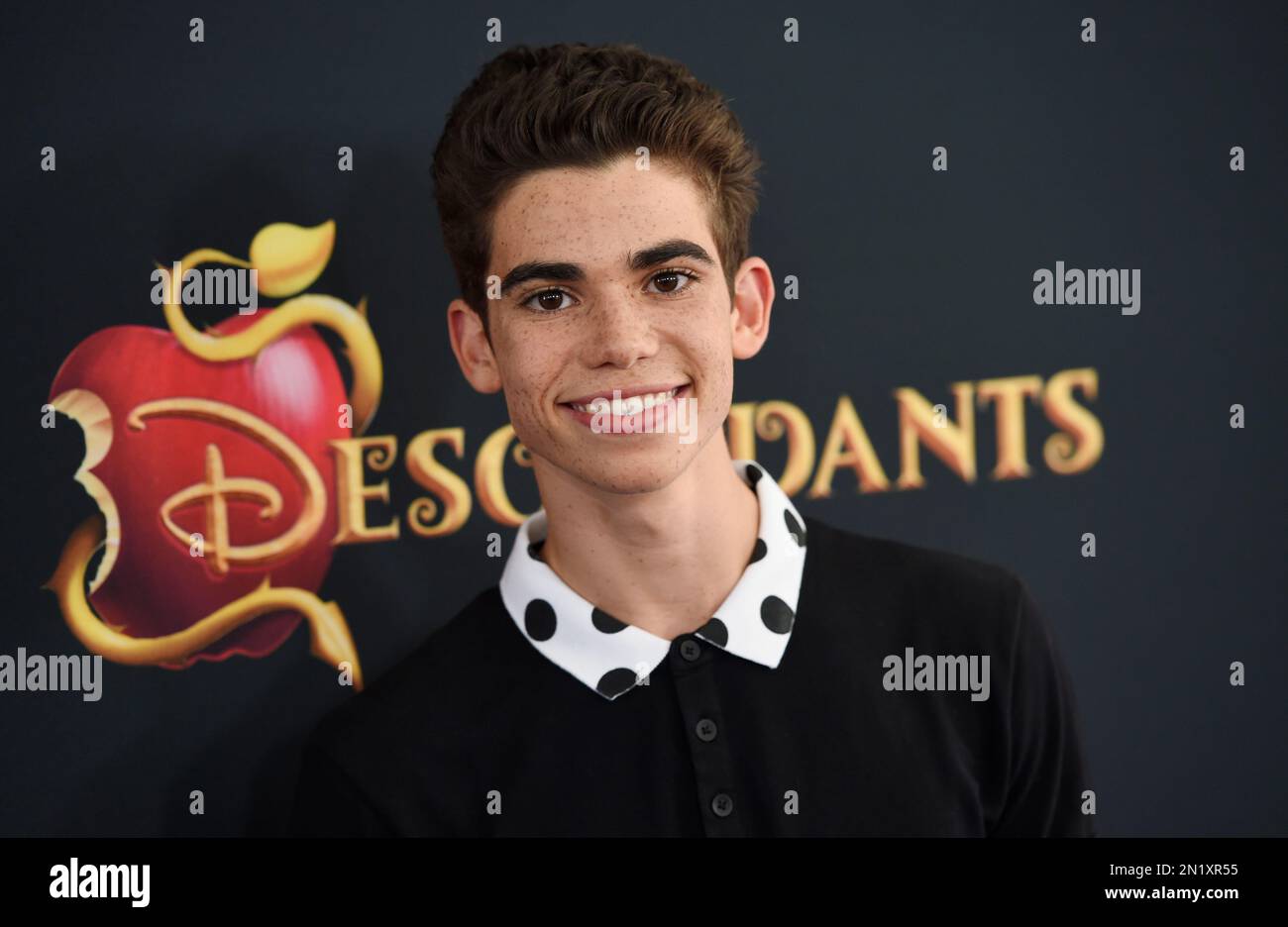 Cameron Boyce, a cast member in "Descendants," poses at the premiere of ...