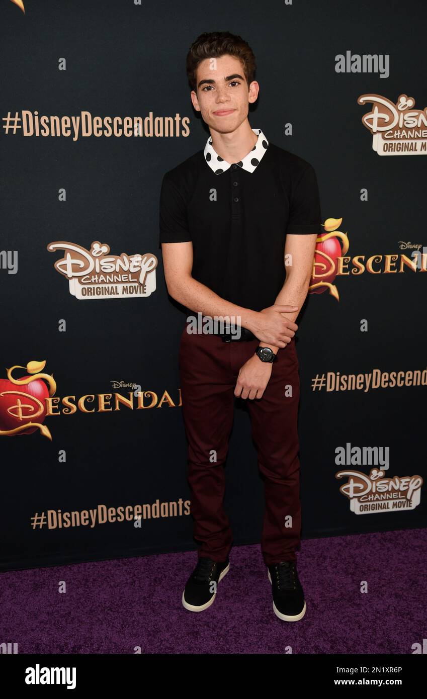 Cameron Boyce, a cast member in "Descendants," poses at the premiere of ...