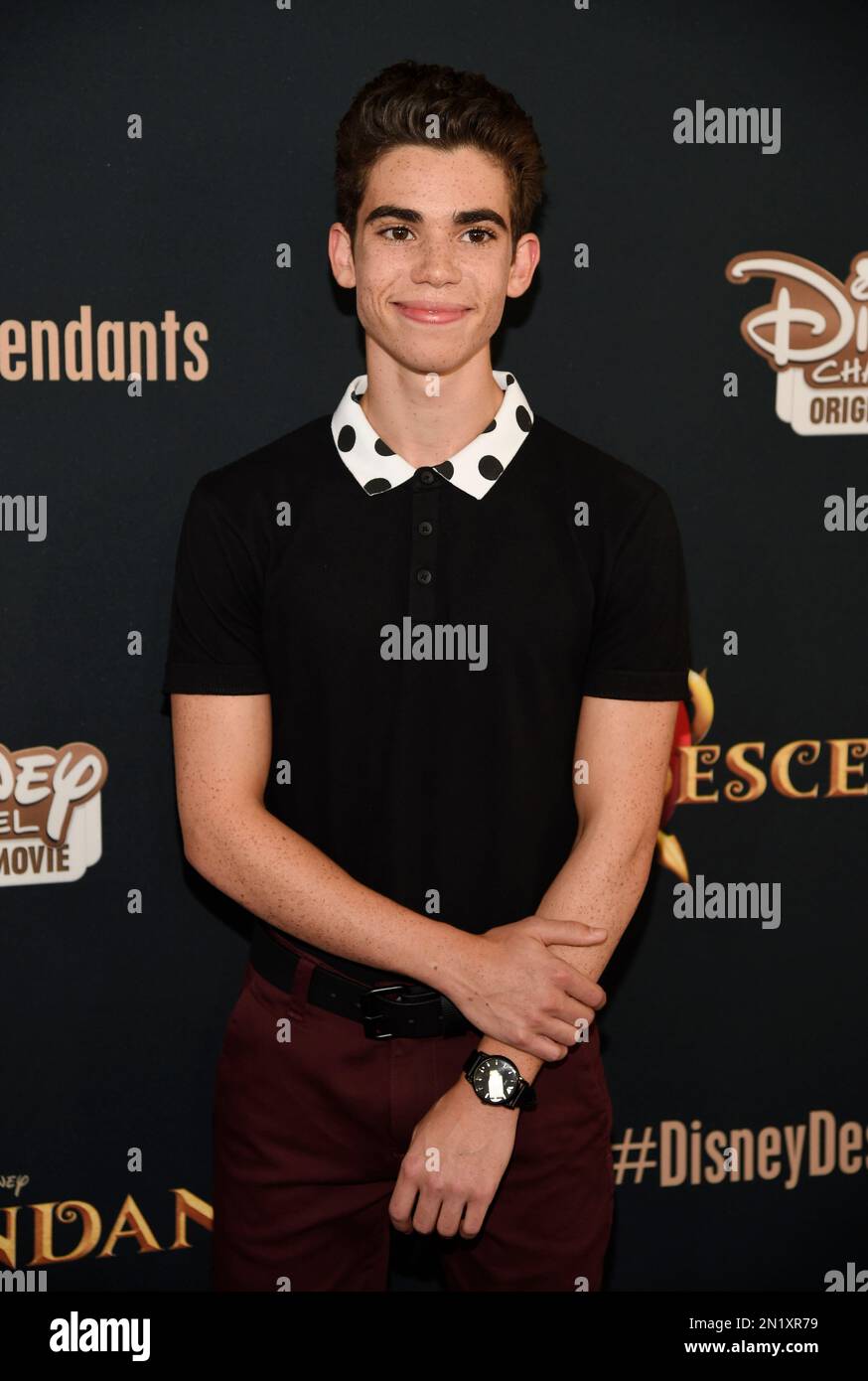 Cameron Boyce, a cast member in "Descendants," poses at the premiere of ...