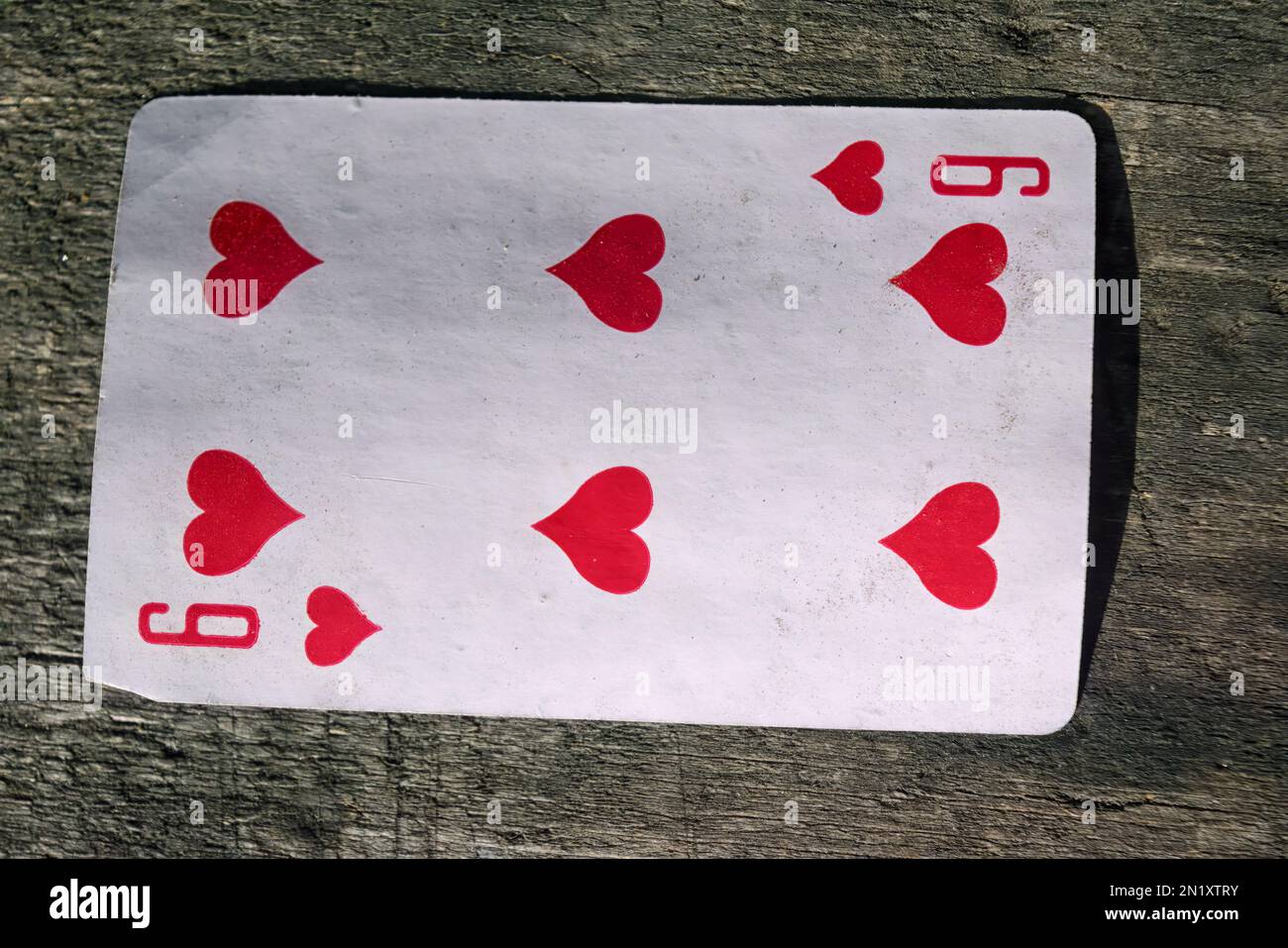 Playing card six hearts hi-res stock photography and images - Alamy