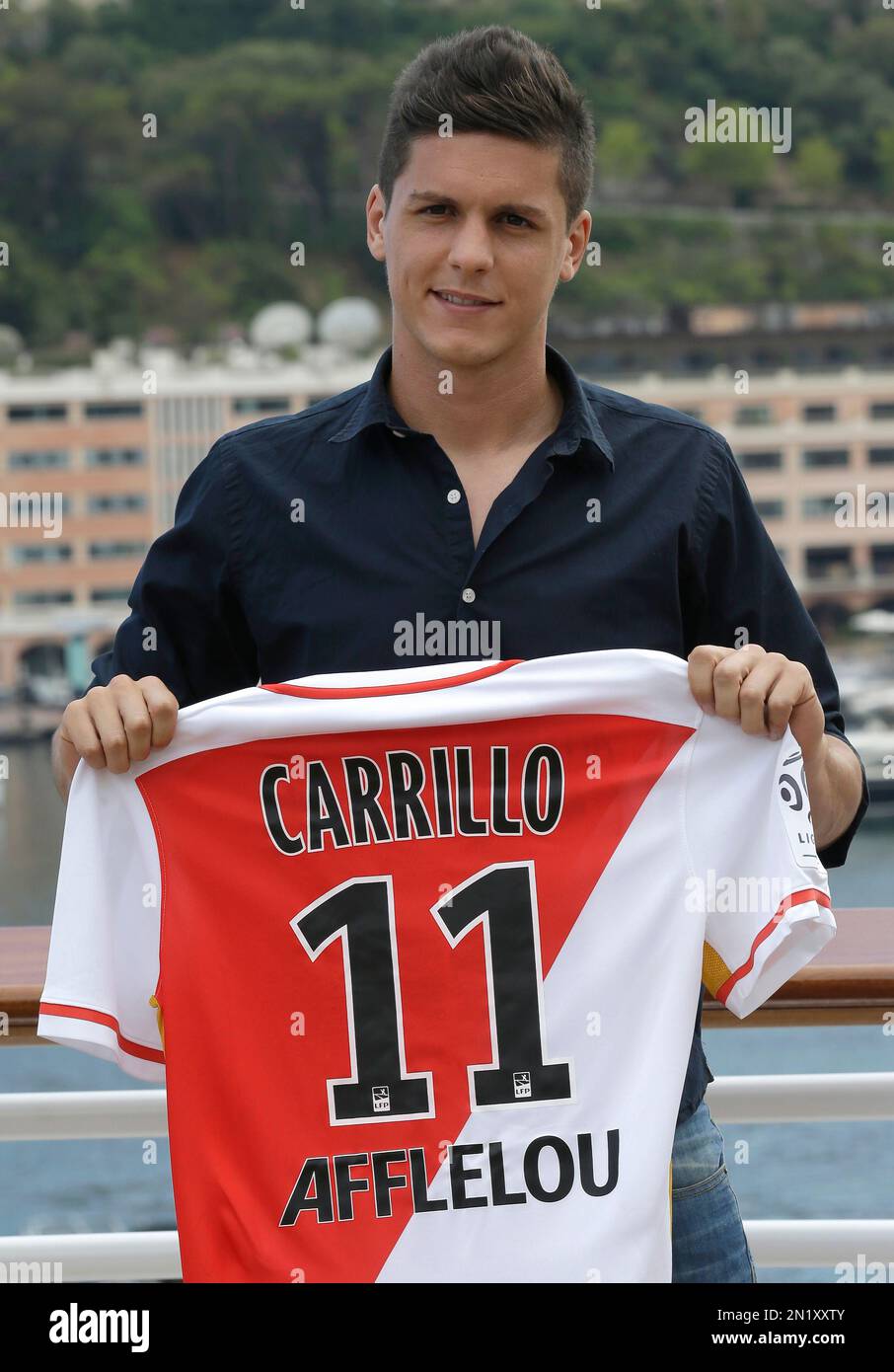 Argentine footballer Guido Carrillo poses with his new shirt of AS ...
