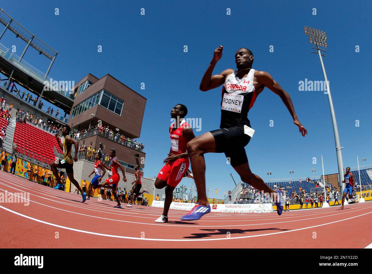 Canada's Brendon Rodney, center, competes against Trinidad and Tobago's ...