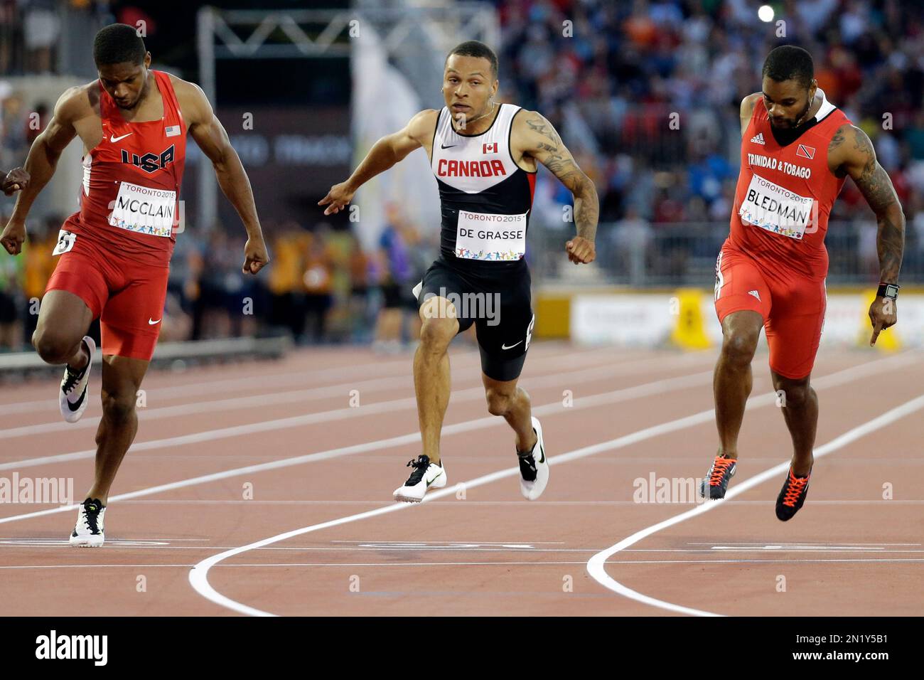 Canada's Andre De Grasse, center, Trinidad and Tobago’s Keston Bledman ...