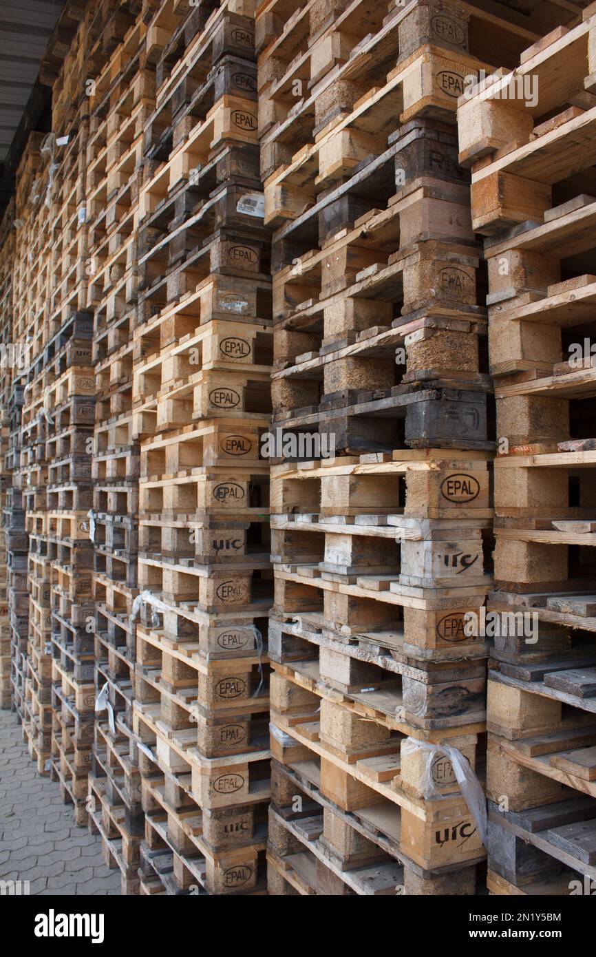 wall of stackes euro pallets outside Stock Photo - Alamy