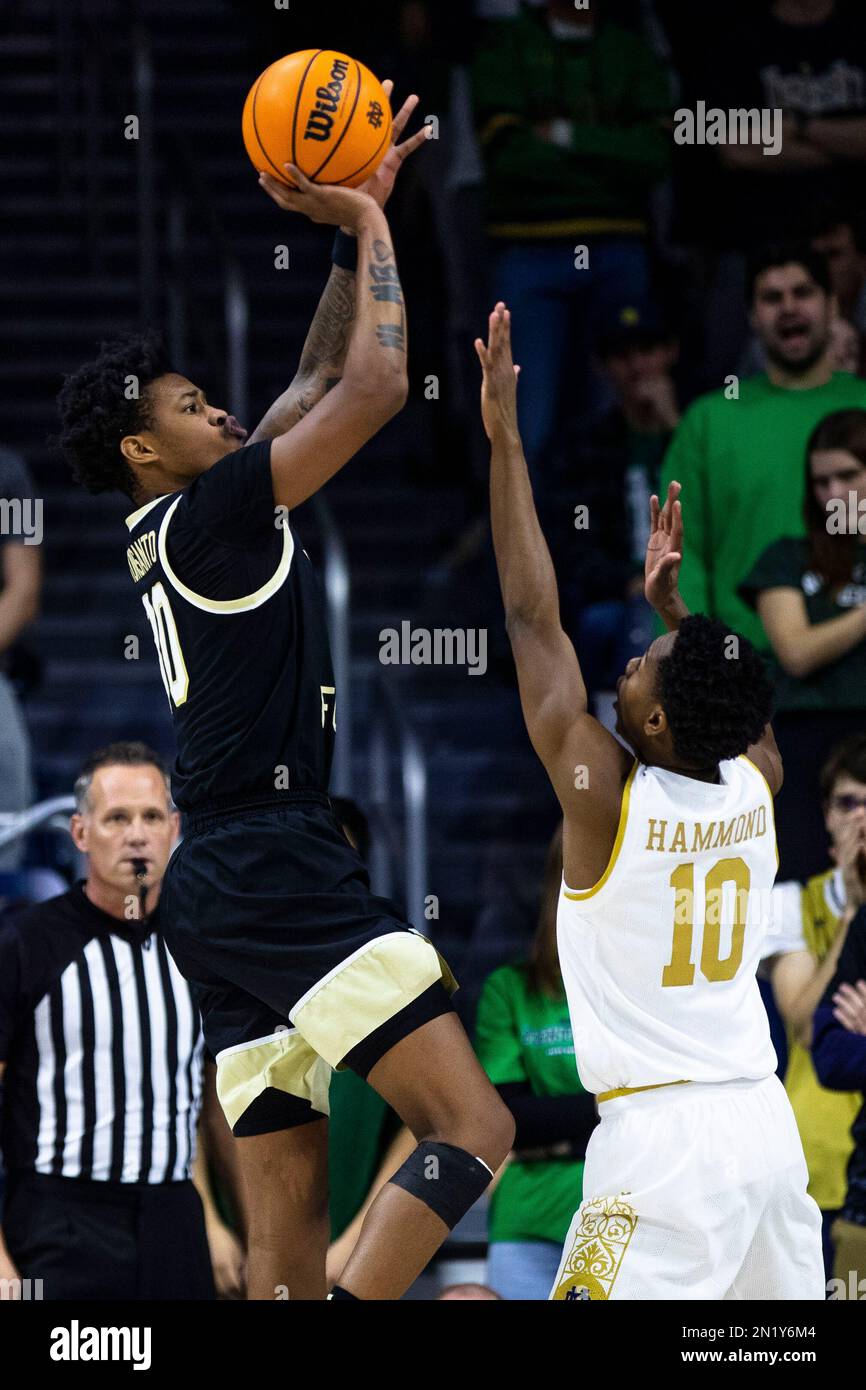 Wake Forest's Jao Ituka (10) shoots as Notre Dame's Marcus Hammond (10 ...